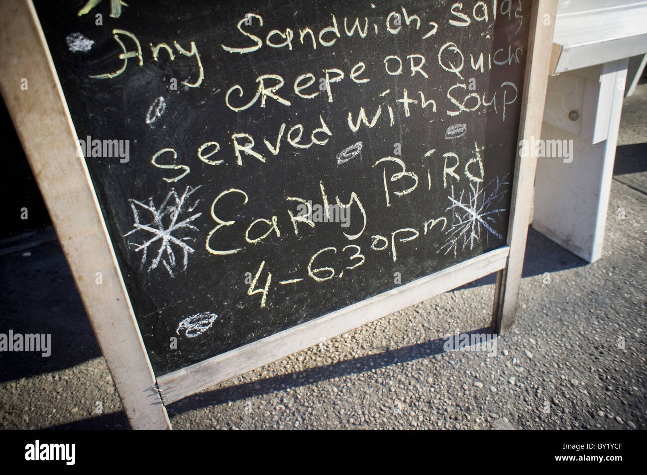 The early bird special is advertised outside a restaurant in New York ...