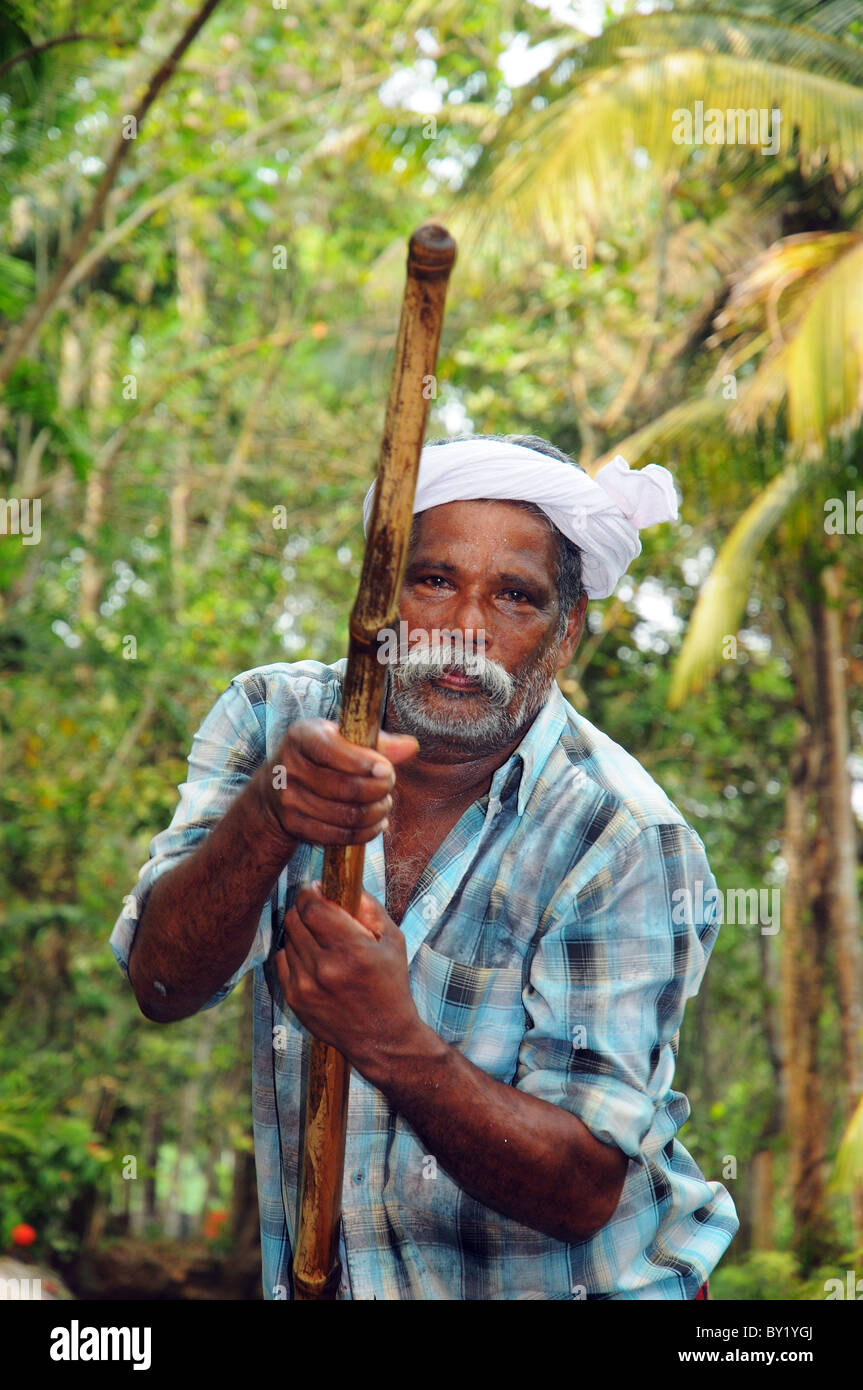Indian man punting in kerala hi-res stock photography and images - Alamy