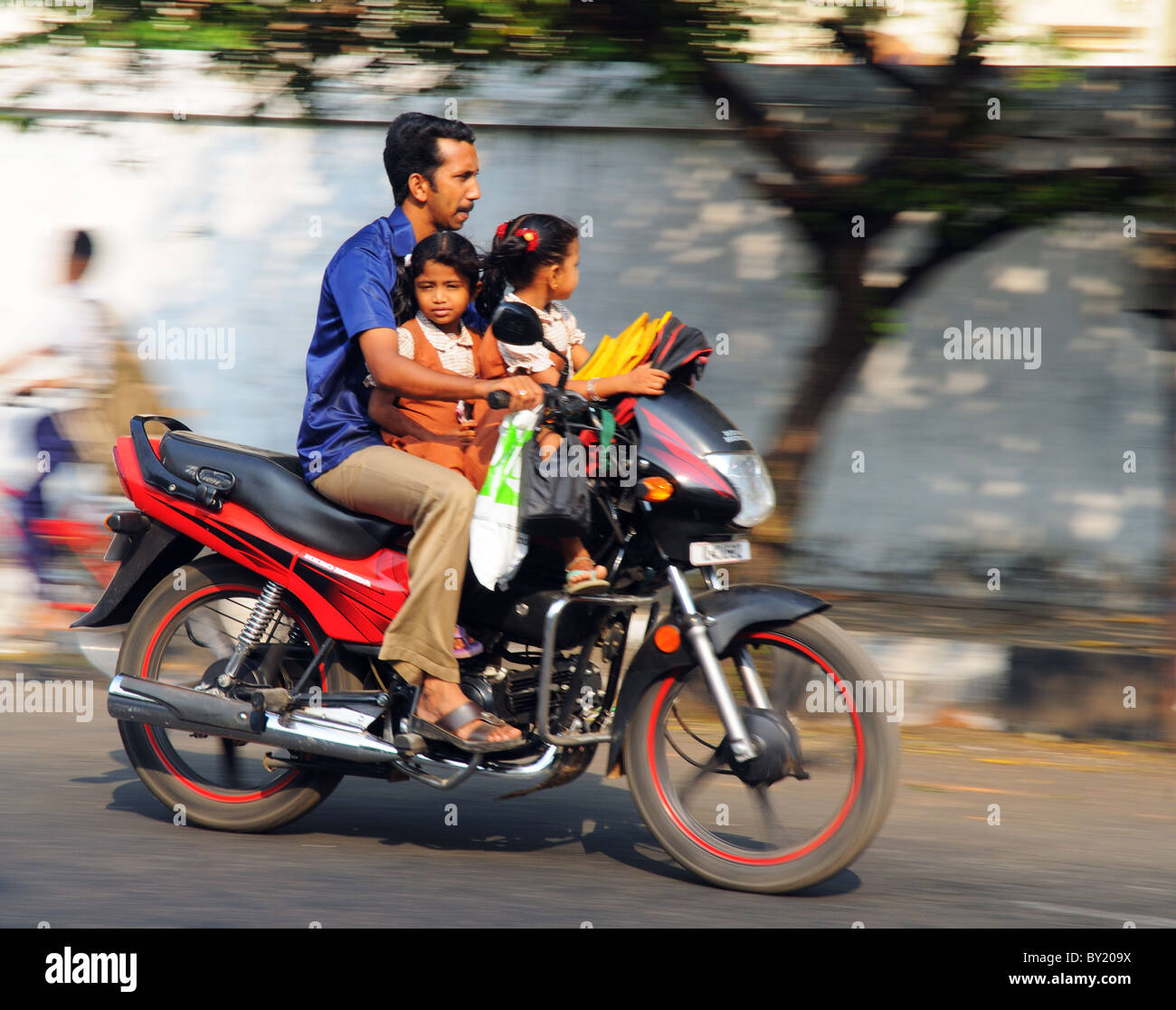 Indian family four on motorcycle hi-res stock photography and images ...