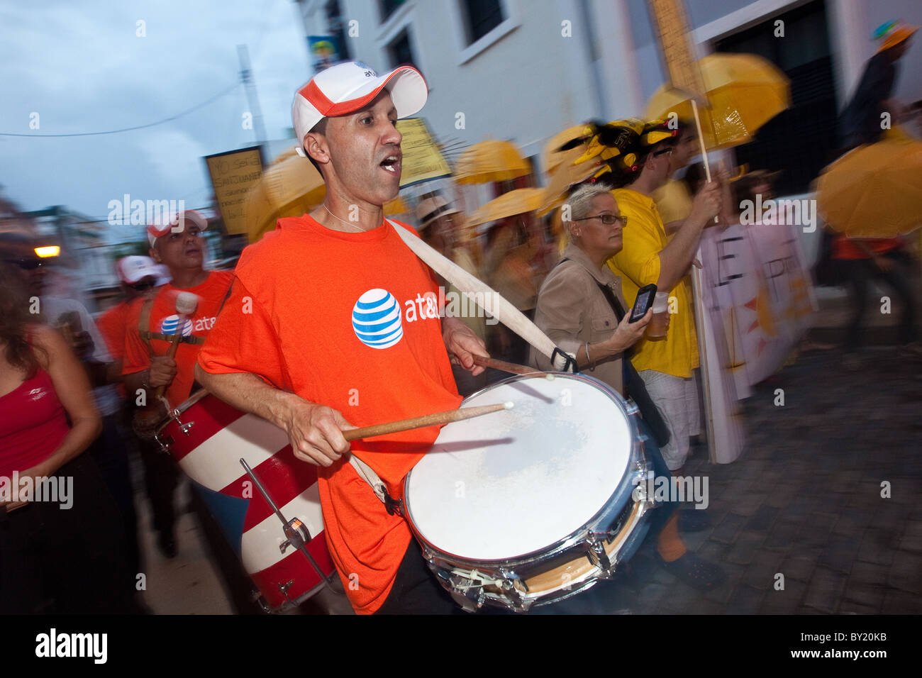 A drummer parades during the Festival of San Sebastian in San Juan ...