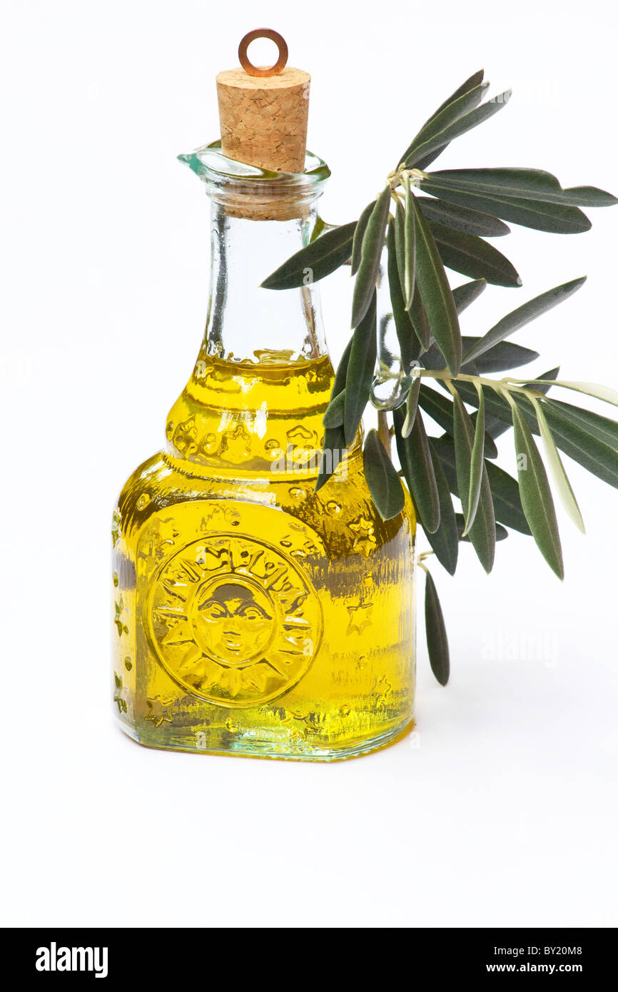 Olive oil and leaves on white background Stock Photo - Alamy