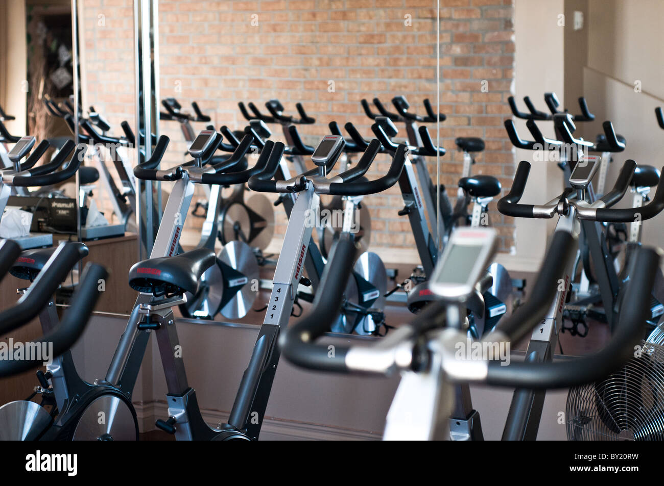 Row of fitness bikes Stock Photo - Alamy