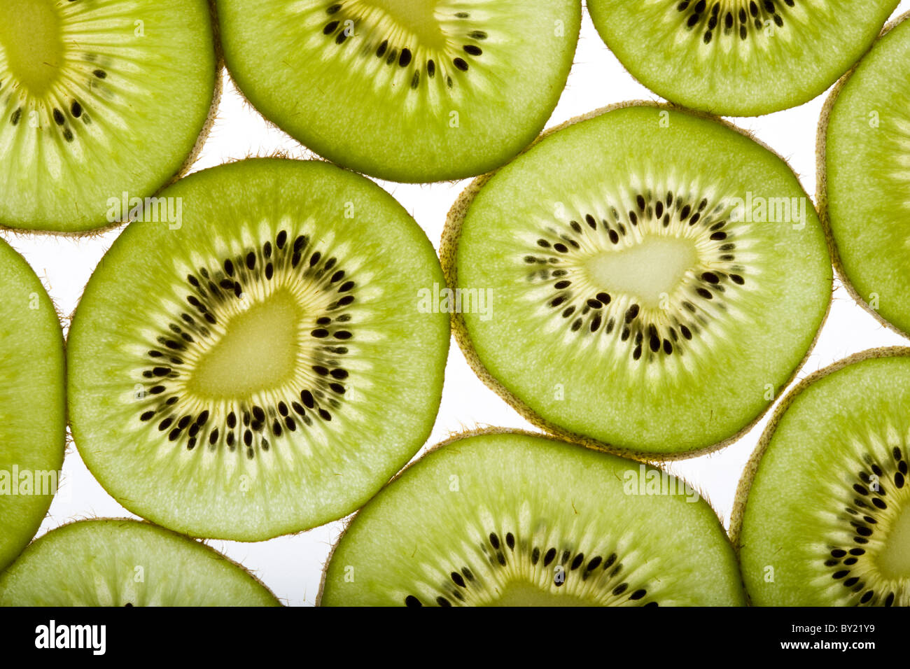 Close-up of several parts of kiwi on a white background Stock Photo - Alamy