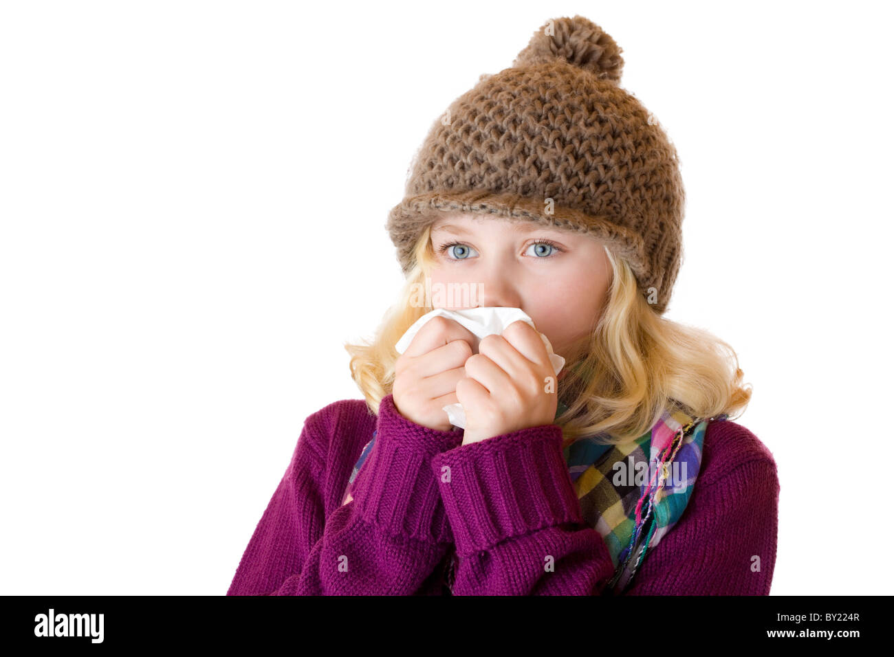 Girl has sniff and blow her nose with a tissue Stock Photo - Alamy
