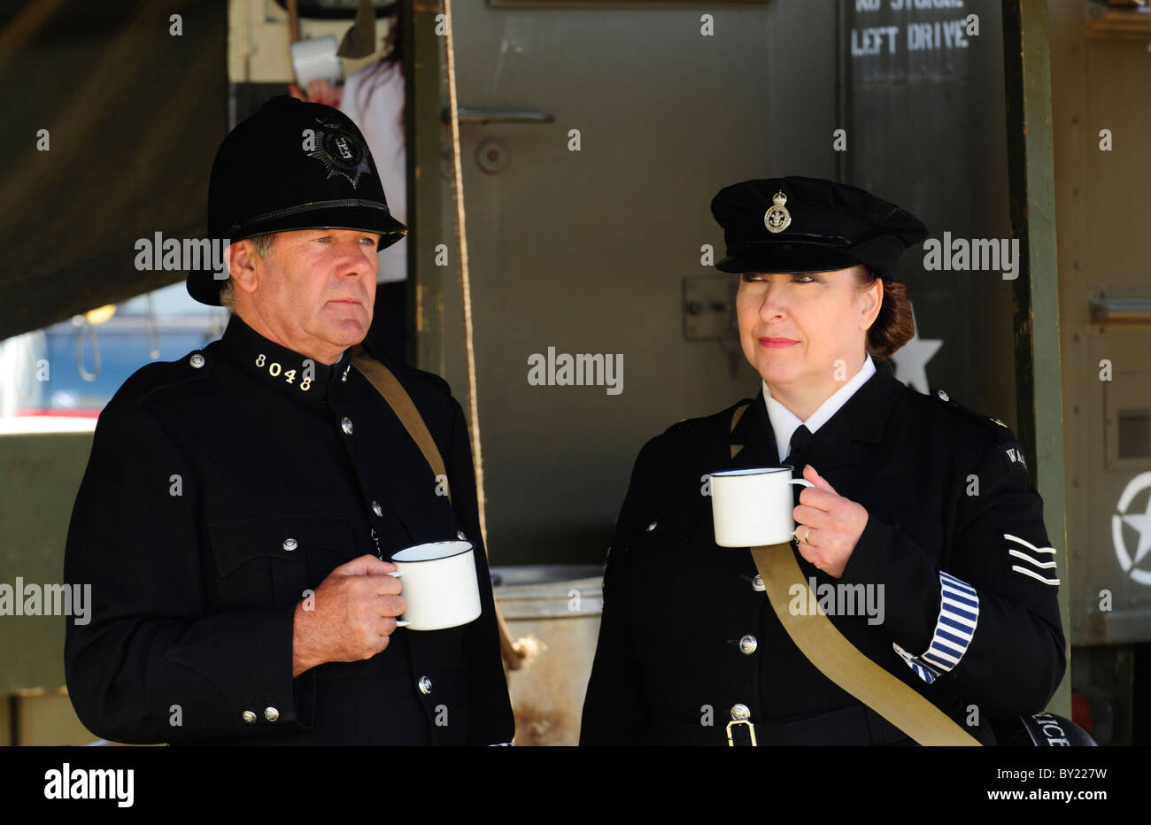 Two enthusiasts dressed as 1940s British Police Officers during a D-Day ...