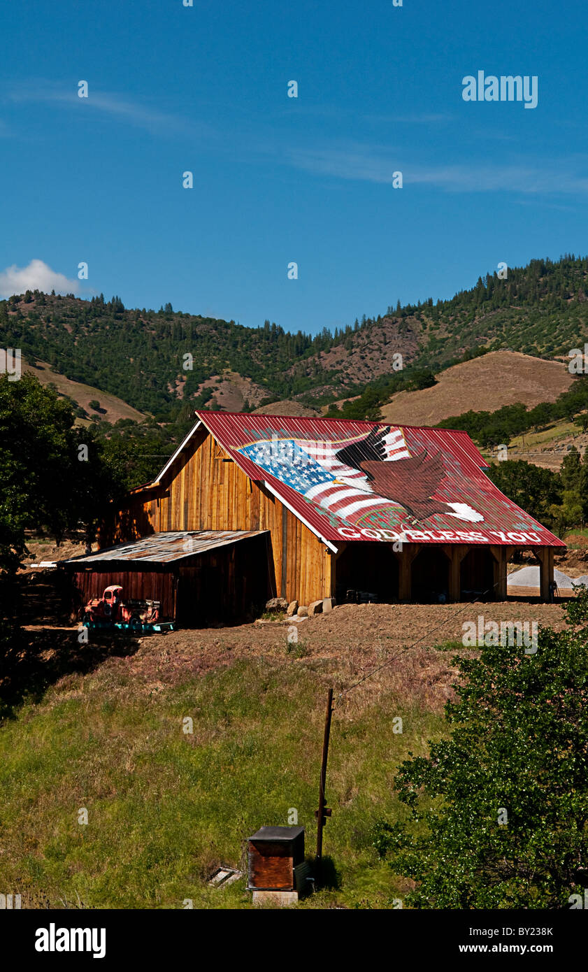 Old colorful barn painted with God Bless You in Yreka California Stock ...