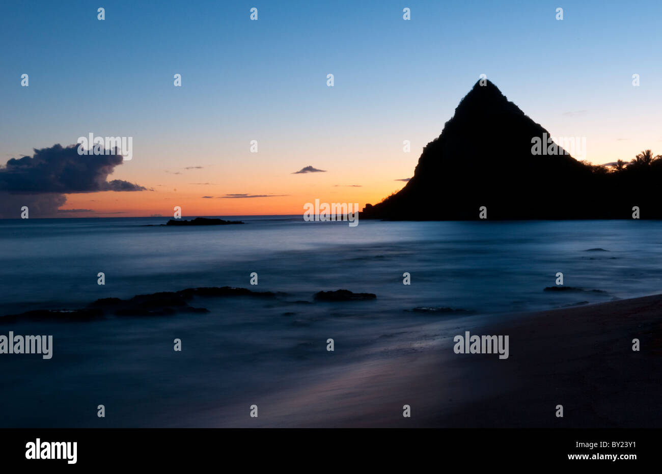 Waianae Pokai Bay Hawaii twilight colorful shots of beach and rocks in ...