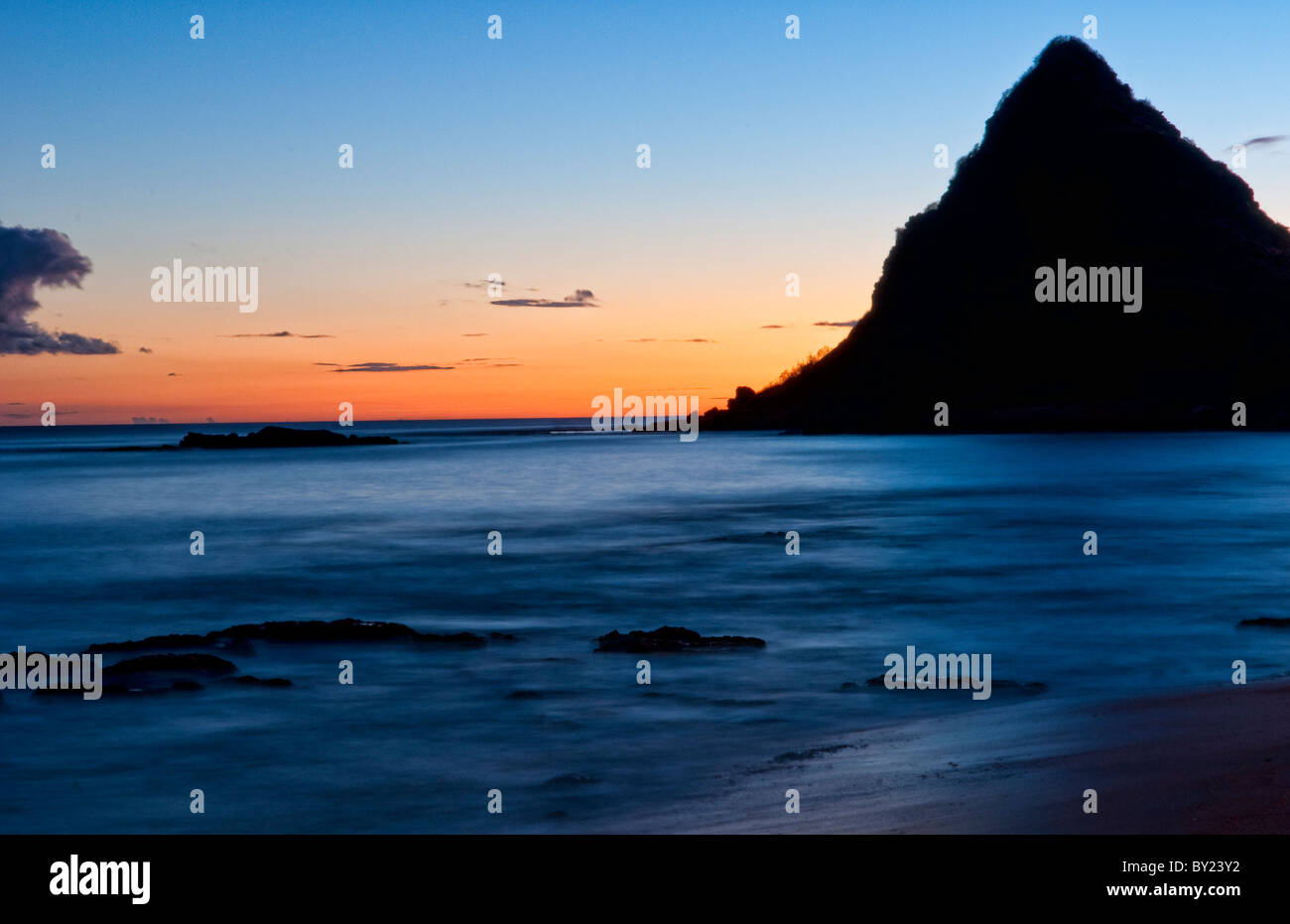 Waianae Pokai Bay Hawaii twilight colorful shots of beach and rocks in ...