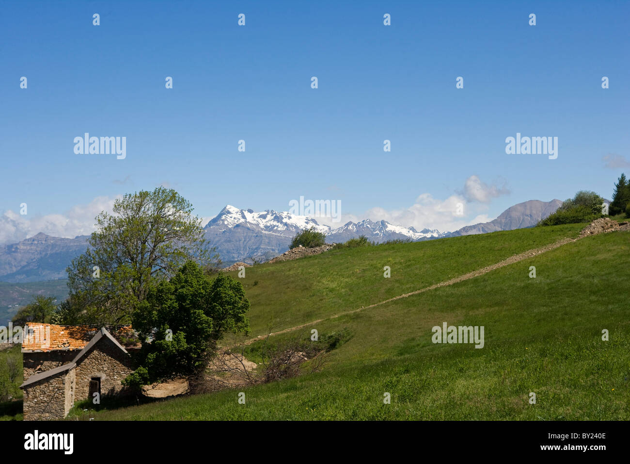 France, Hautes-Alpes, Gap. High altitude shepherds barn with snow ...