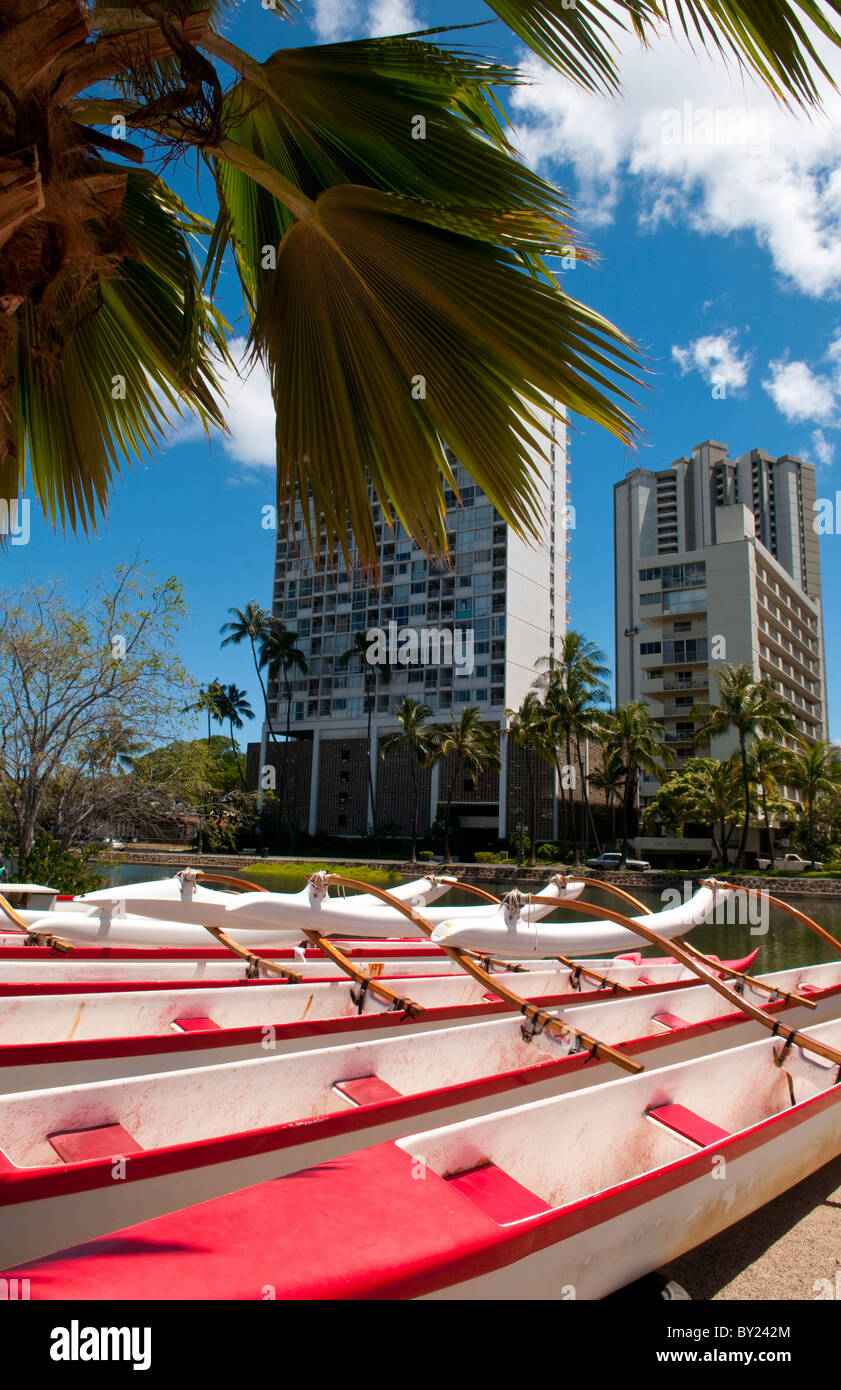 Hawaii Honolulu close up of colorful red outrigger boats in downtown ...