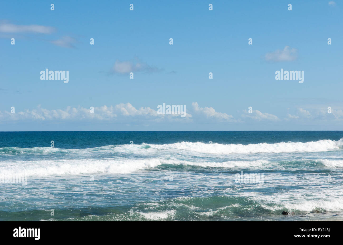 Hawaii Honolulu waves of ocean welcoming swimmers in East Oahu Stock ...