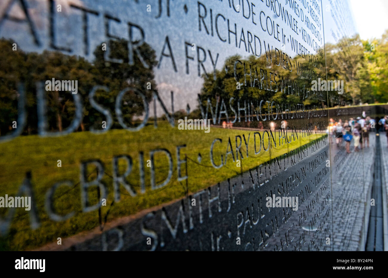 Reflections of hero names of war dead at Vietnam Veterans Memorial Wall ...