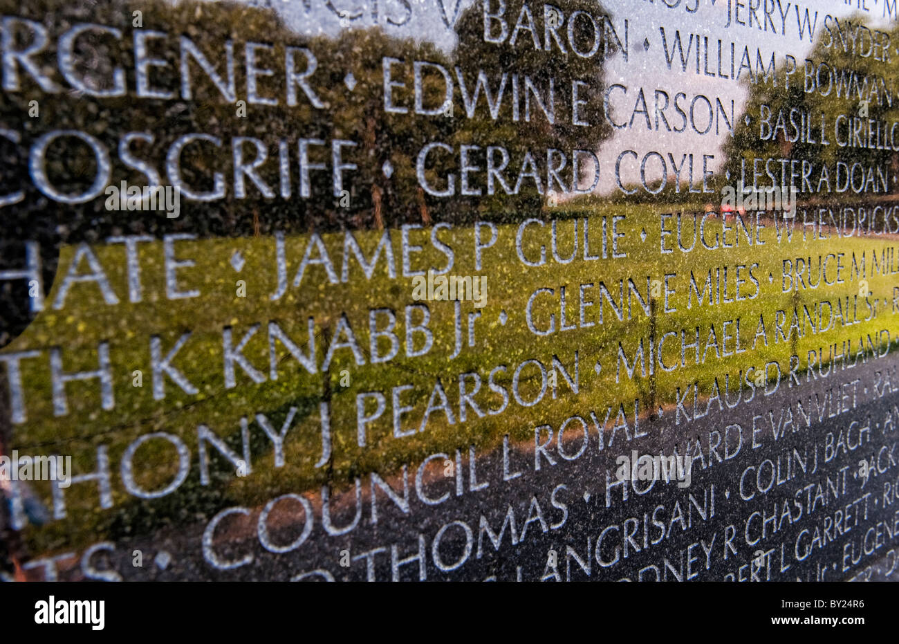 Reflections of hero names of war dead at Vietnam Veterans Memorial Wall ...