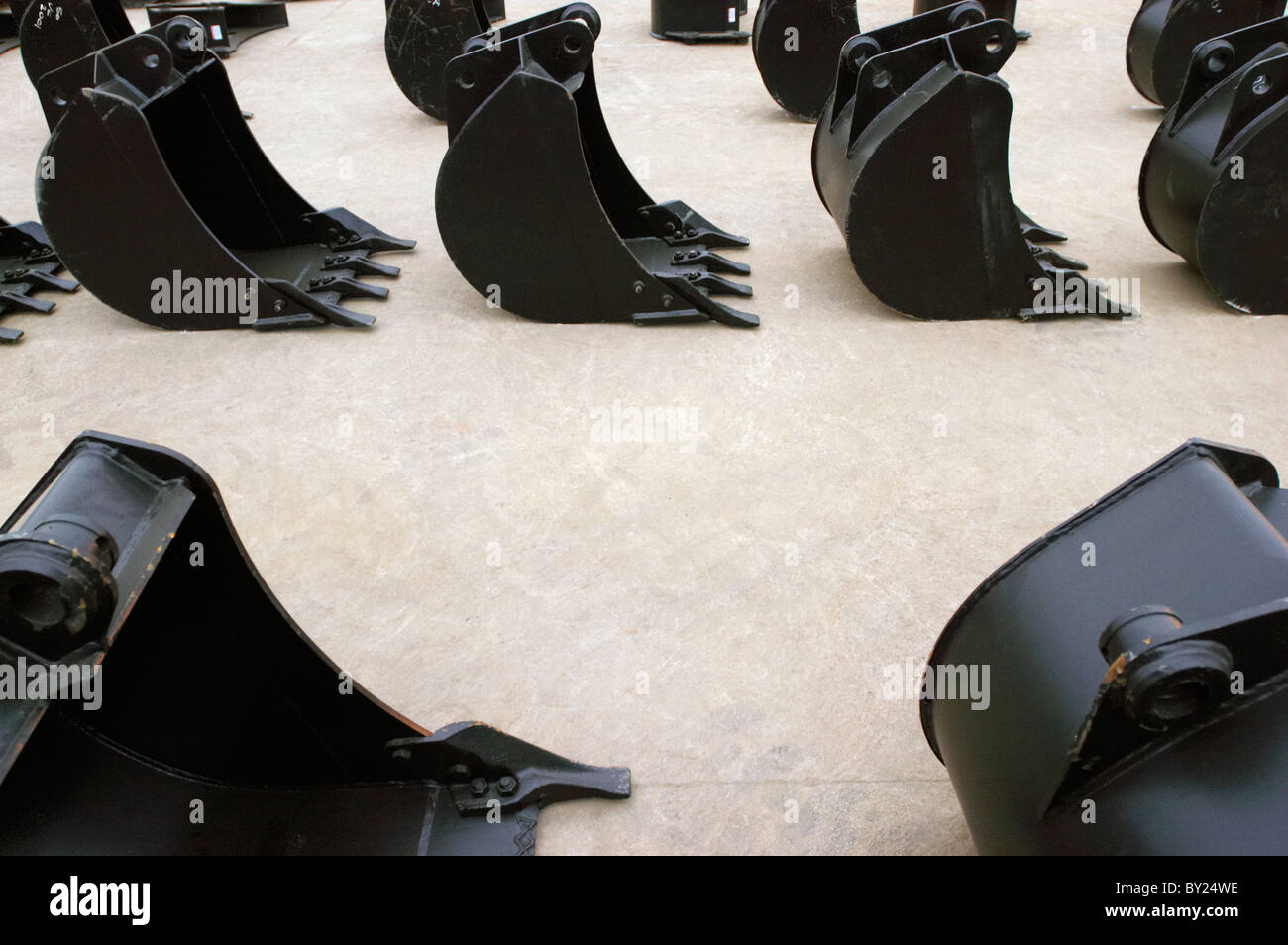 Black digging buckets Stock Photo - Alamy