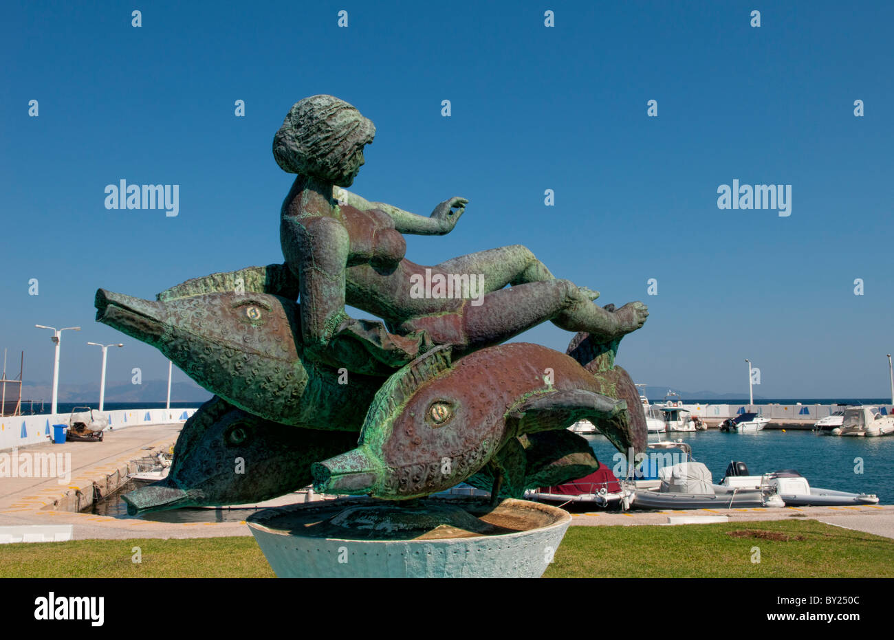 Mati Greece statue of bronze at park near water at beach playground ...