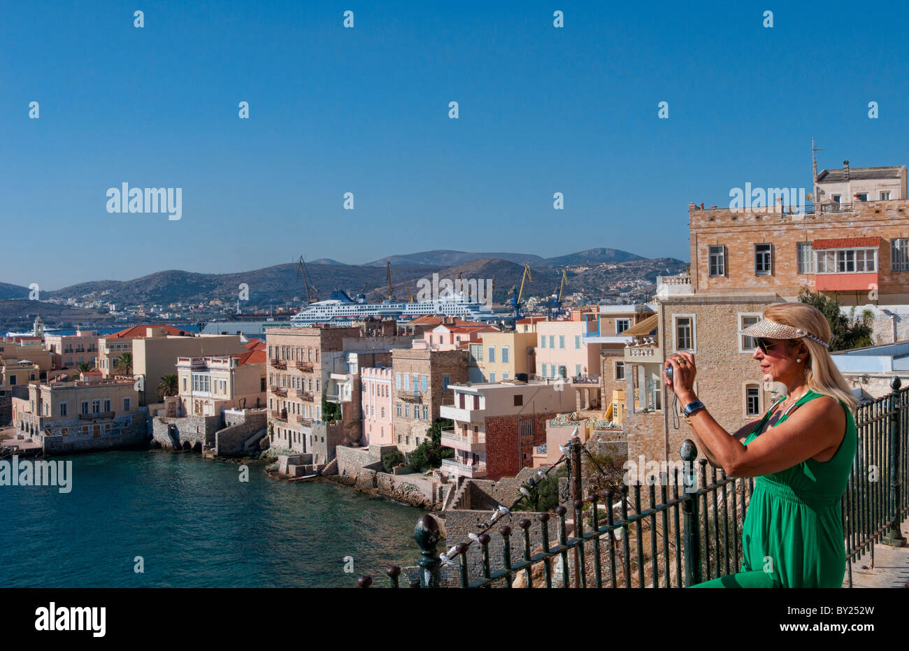 Syros Greece Islands a woman tourist camera in Hermoupolis capital with ...