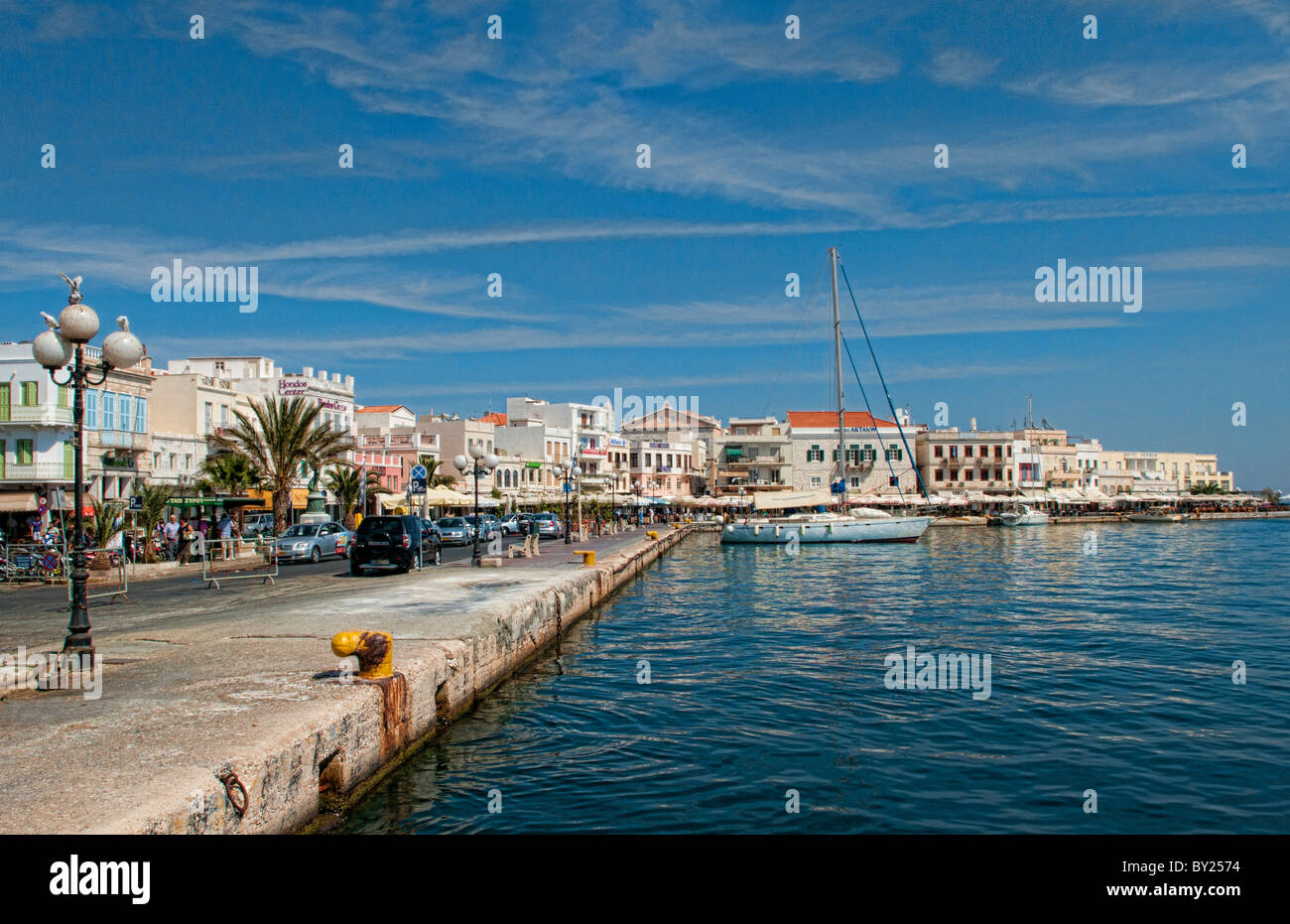 Quaint harbor and main street in downtown area of capital of Syros ...
