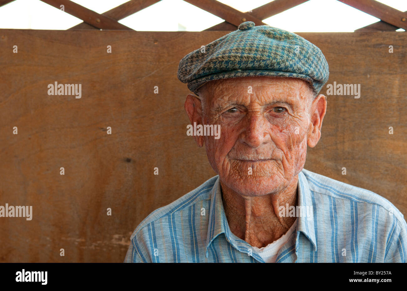 Old man 85 years old in Syros Greece island with hat and portrait smile ...
