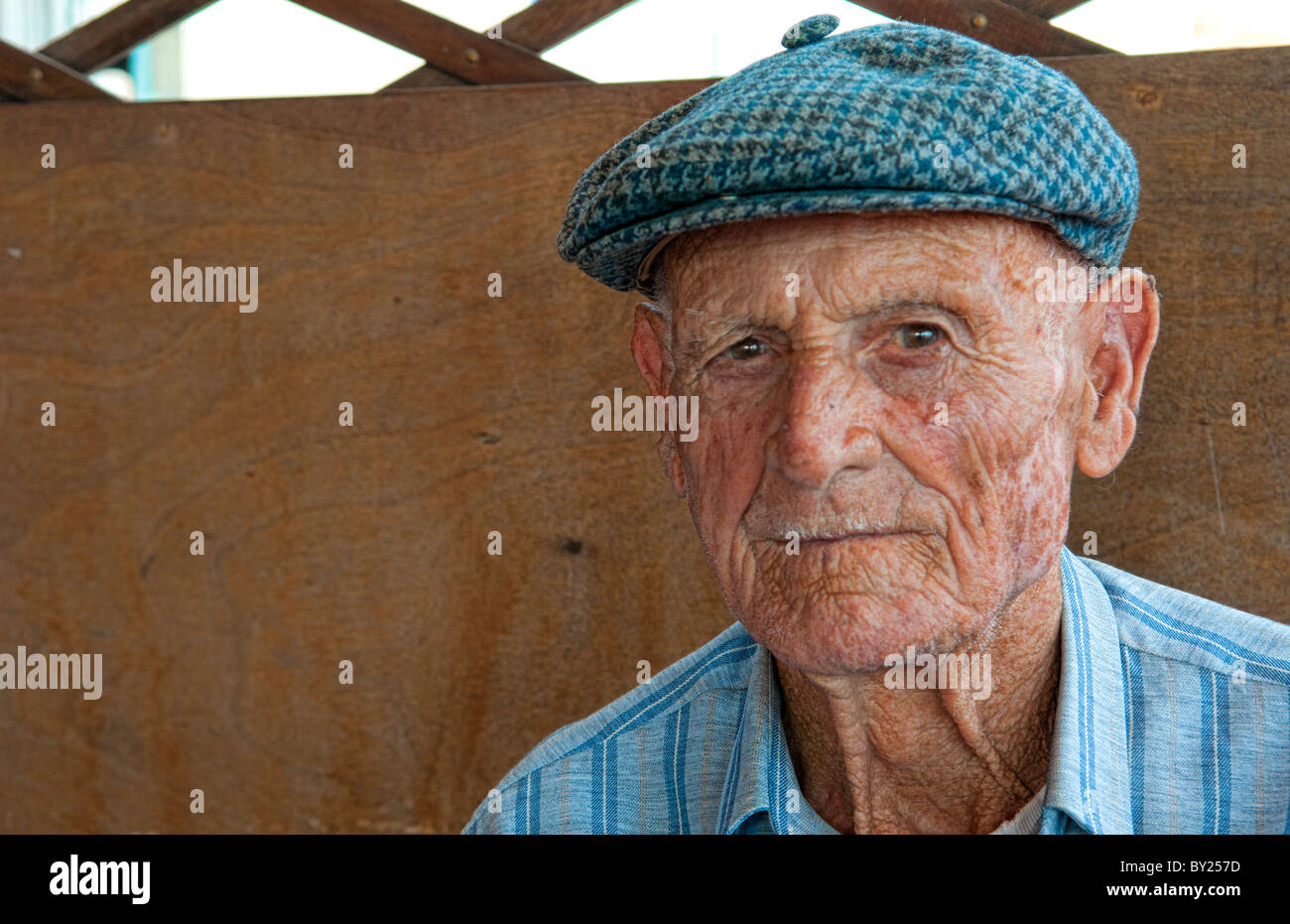 Old man 85 years old in Syros Greece island with hat and portrait smile ...