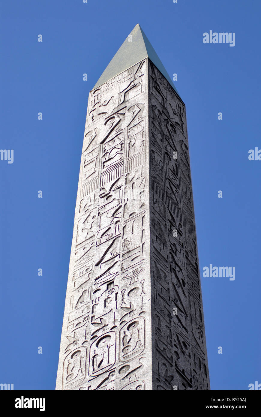 Closeup of top obelisk of Paris on the place de la Concorde isolated on ...