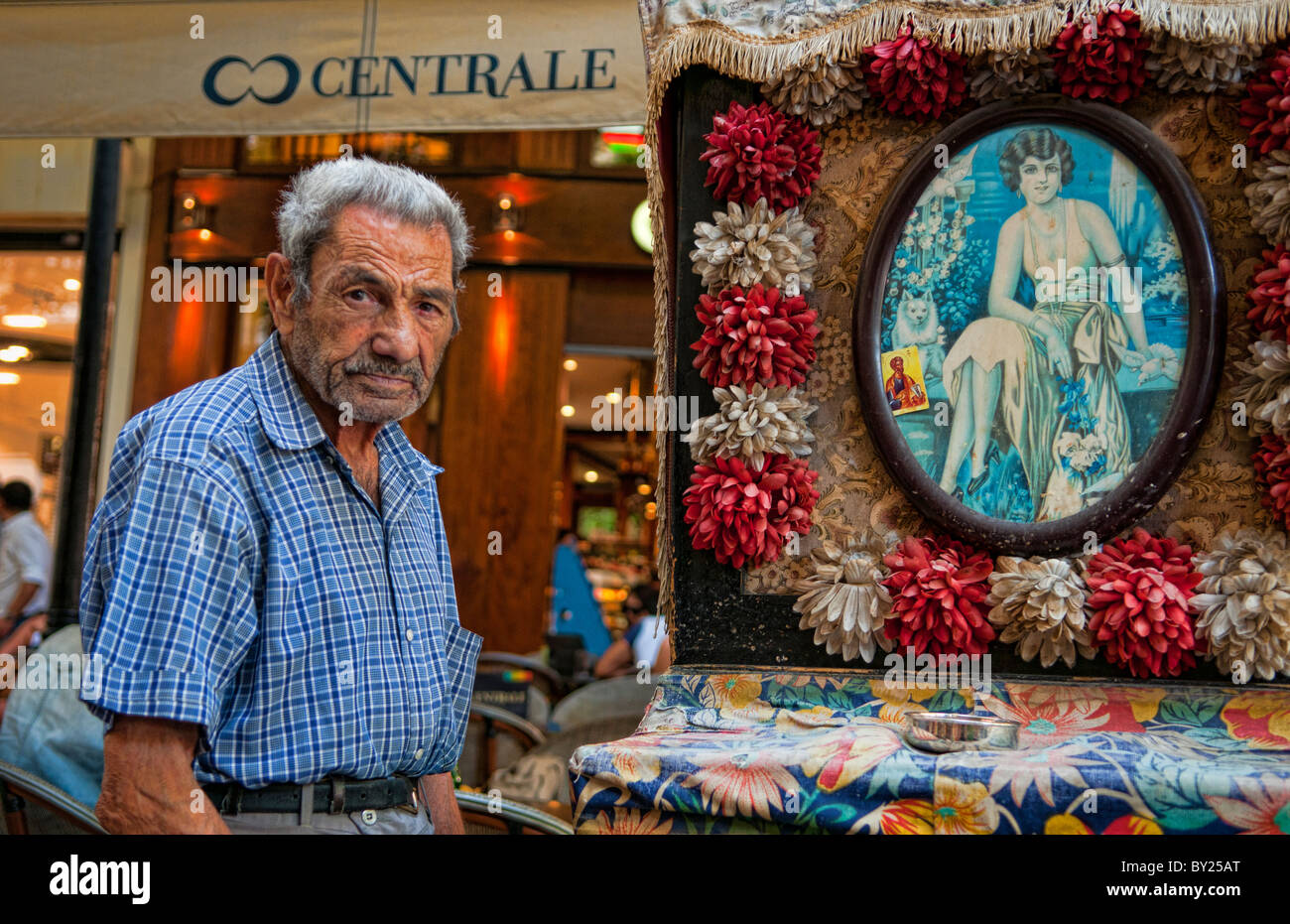 Old man playing instrument called Laterna in Plaka in downtown Athens ...