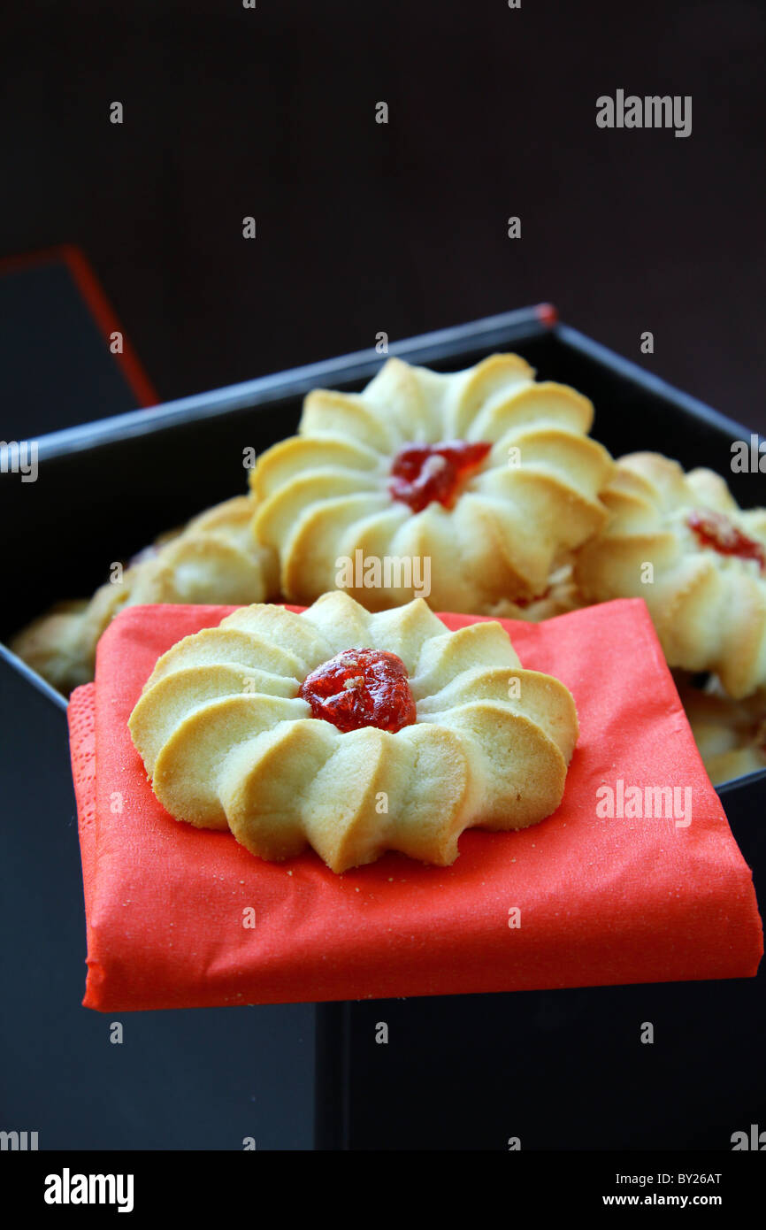 beautiful cookies with jam on a brown background Stock Photo - Alamy