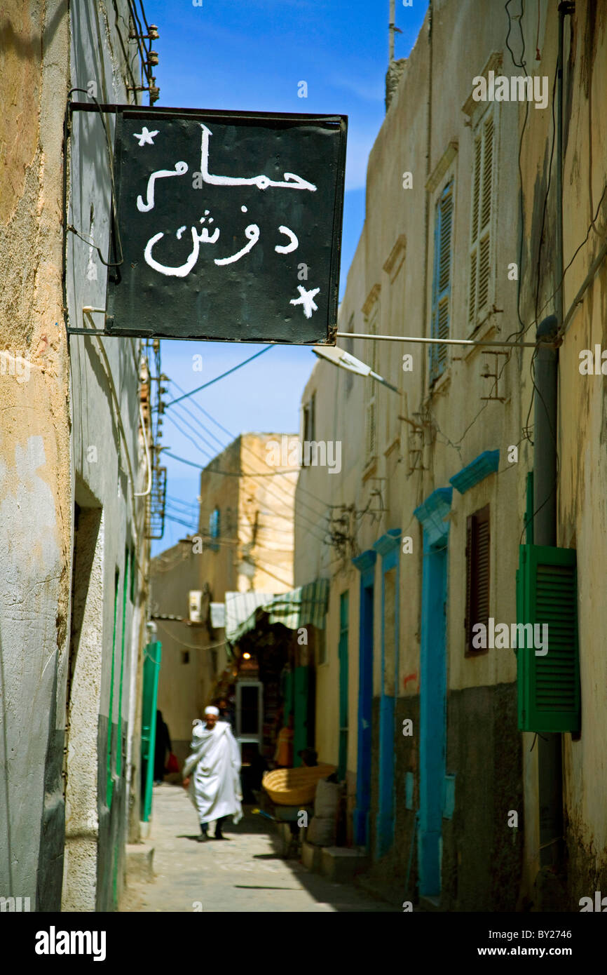 Tripoli, Libya; An elderly Muslim man dressed in white walking to one ...