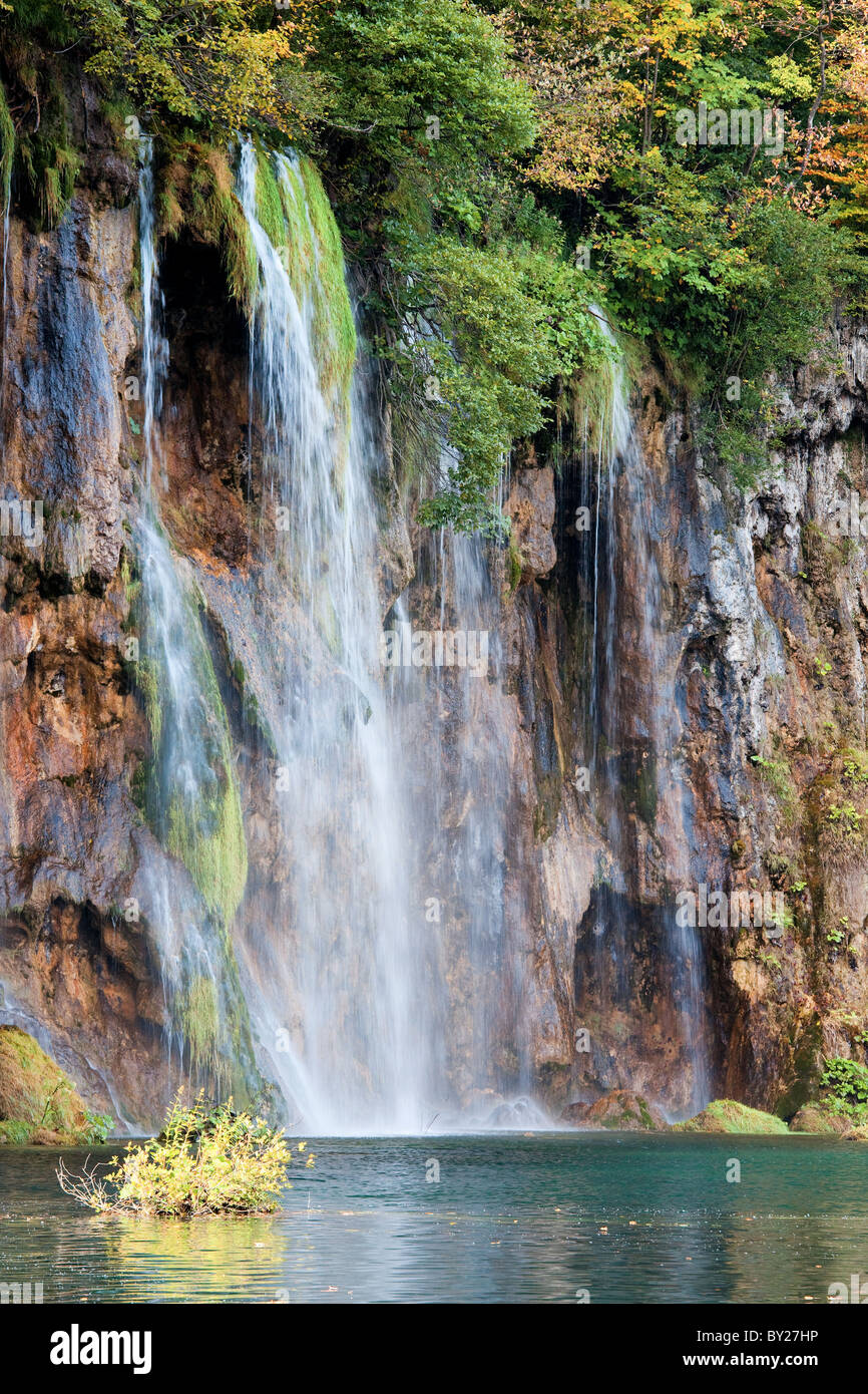 Scenic waterfall during the fall season Stock Photo - Alamy