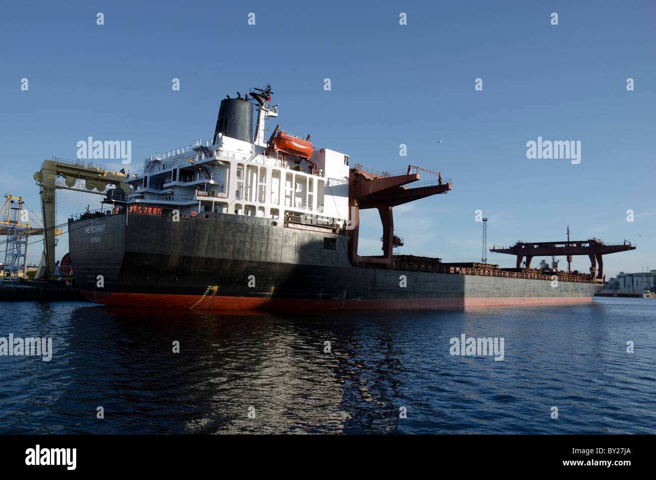 Ship berthed at Leith Docks, Edinburgh, Scotland, unloading a cargo of ...