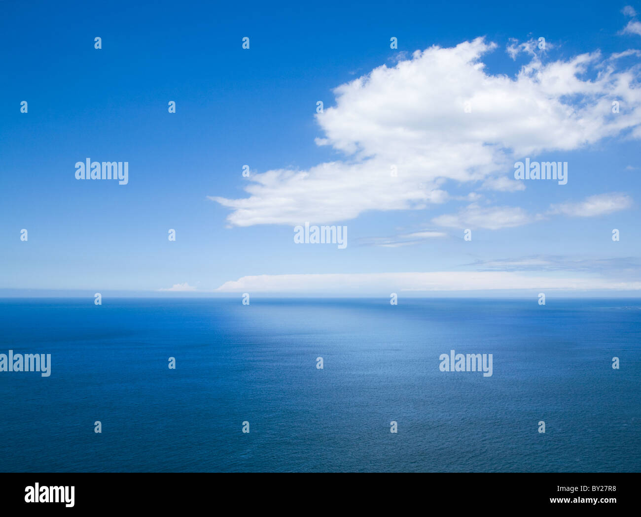 natural horizontal background - view over the ocean far below; white ...