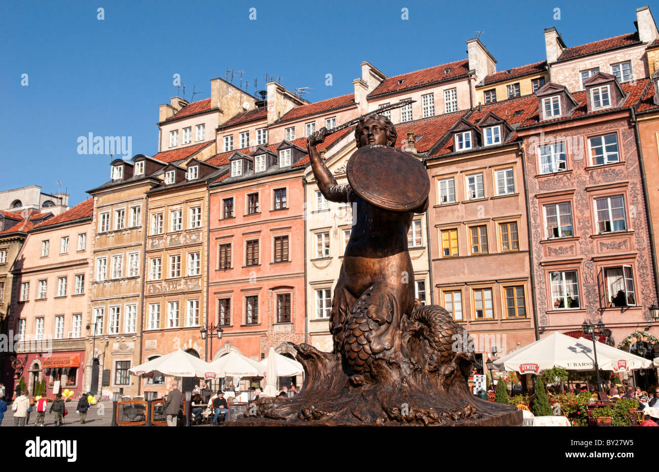 Beautiful bronze statue in middle of Main Old Town Main Square Warsaw ...