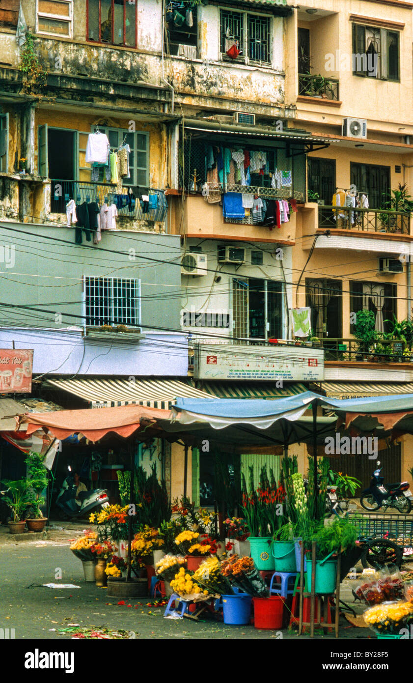Vietnam Saigon Ho Chi Minh City street scene flowers laundry center ...