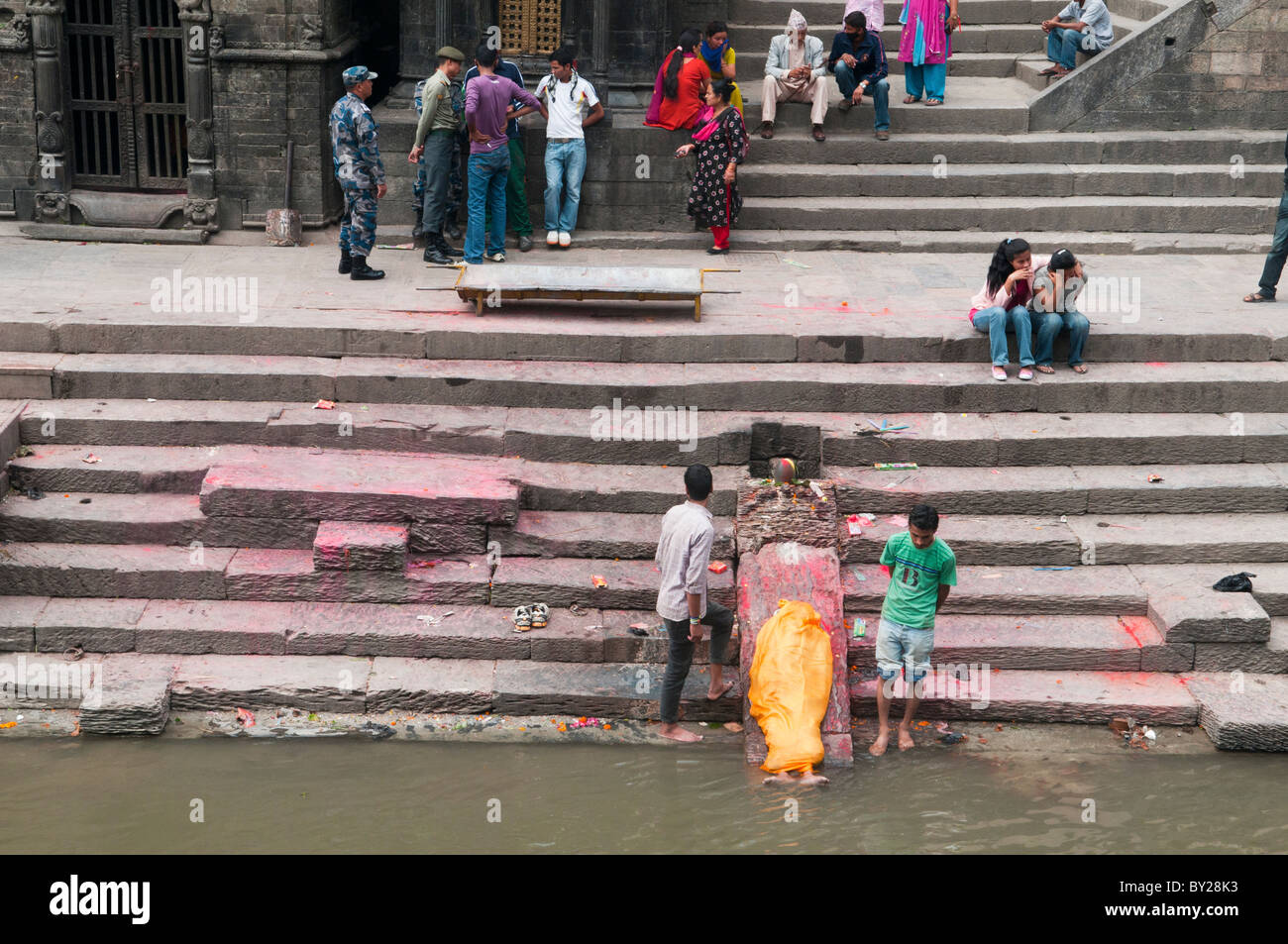 last rites at a cremation funeral on the Bagmati River at the ...