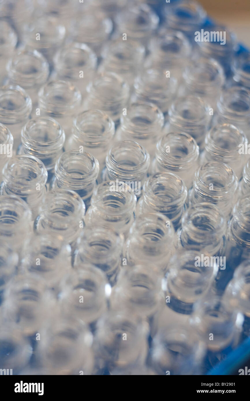 water samples from industrial waste water being sampled in a laboratory ...