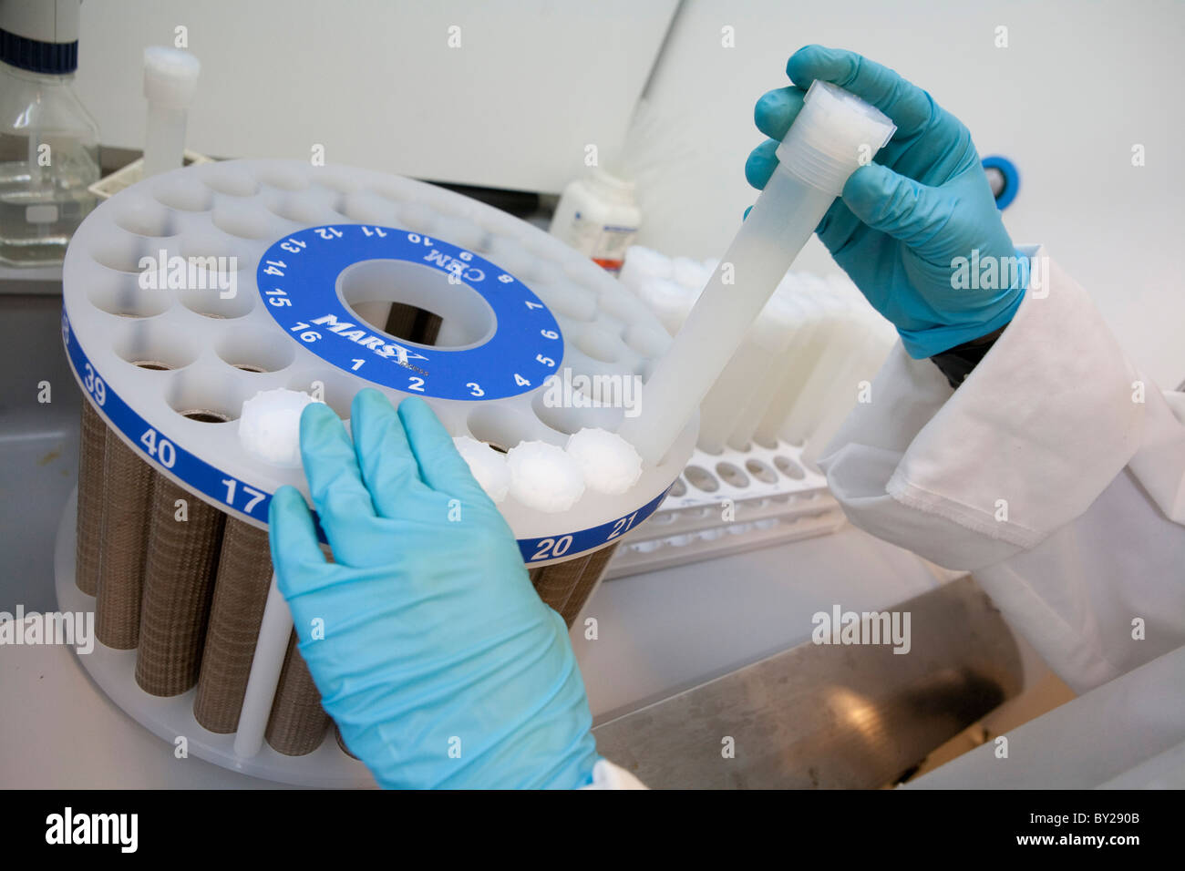 water samples from industrial waste water being sampled in a laboratory ...