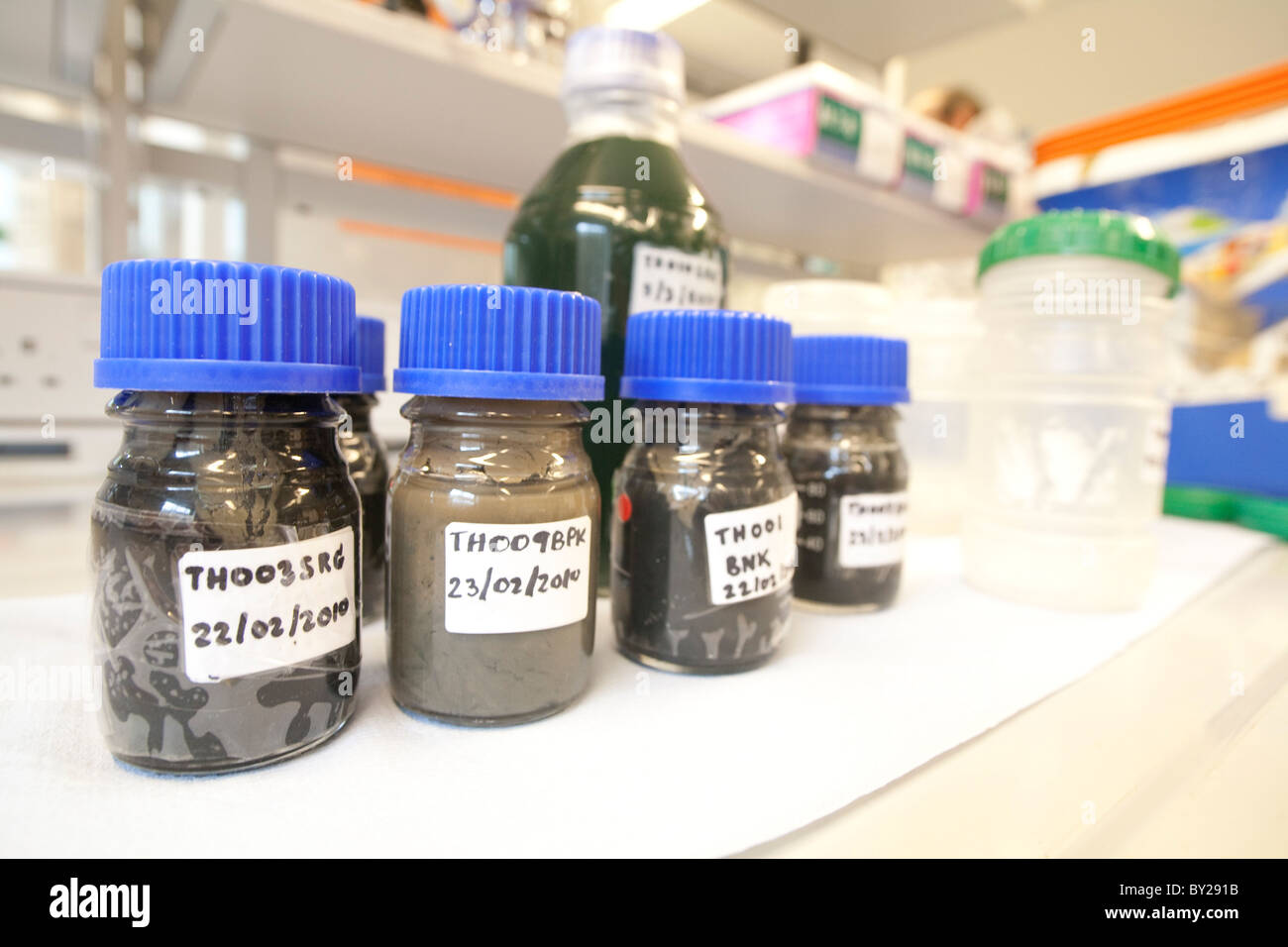 water samples from industrial waste water being sampled in a laboratory ...