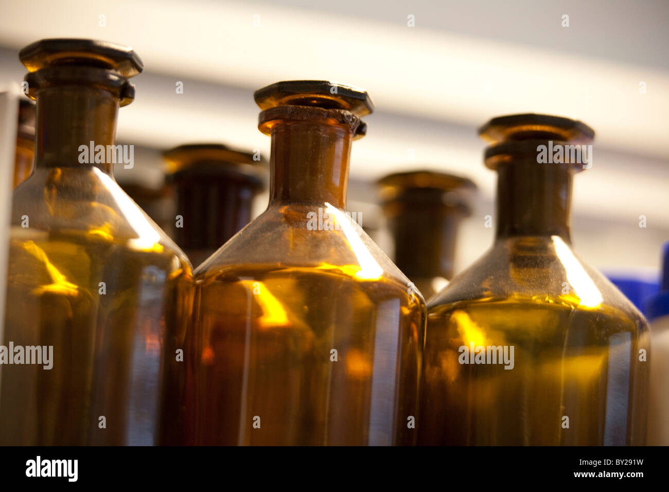 water samples from industrial waste water being sampled in a laboratory ...