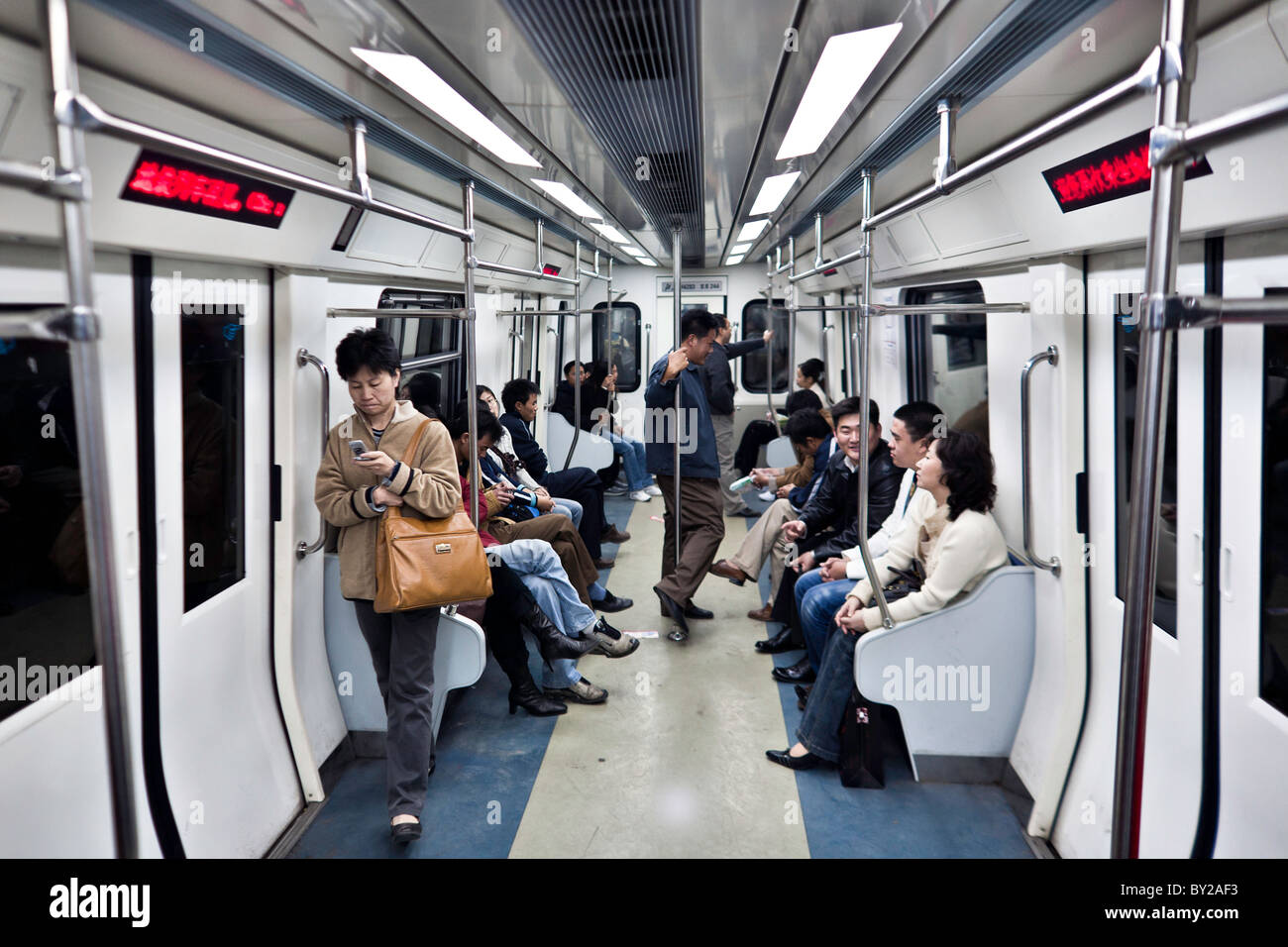 CHINA, BEIJING: Beijing underground subway train crowded with young ...