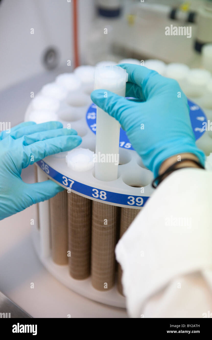 water samples from industrial waste water being sampled in a laboratory ...