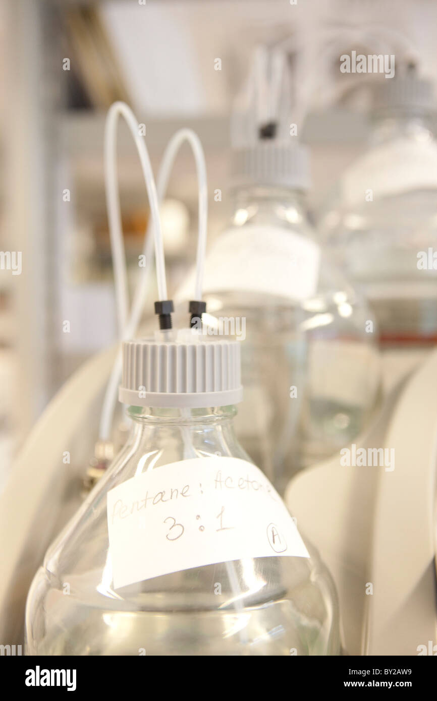 water samples from industrial waste water being sampled in a laboratory ...