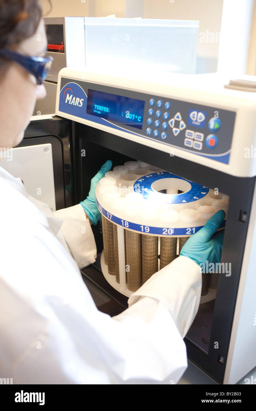 water samples from industrial waste water being sampled in a laboratory ...