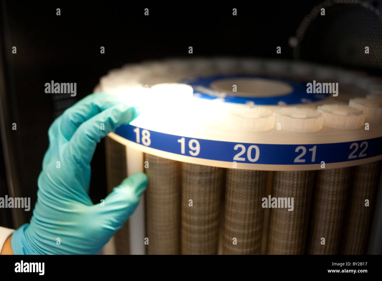 water samples from industrial waste water being sampled in a laboratory ...