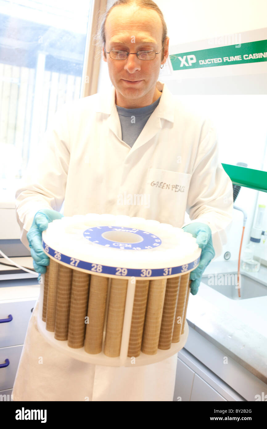 water samples from industrial waste water being sampled in a laboratory ...
