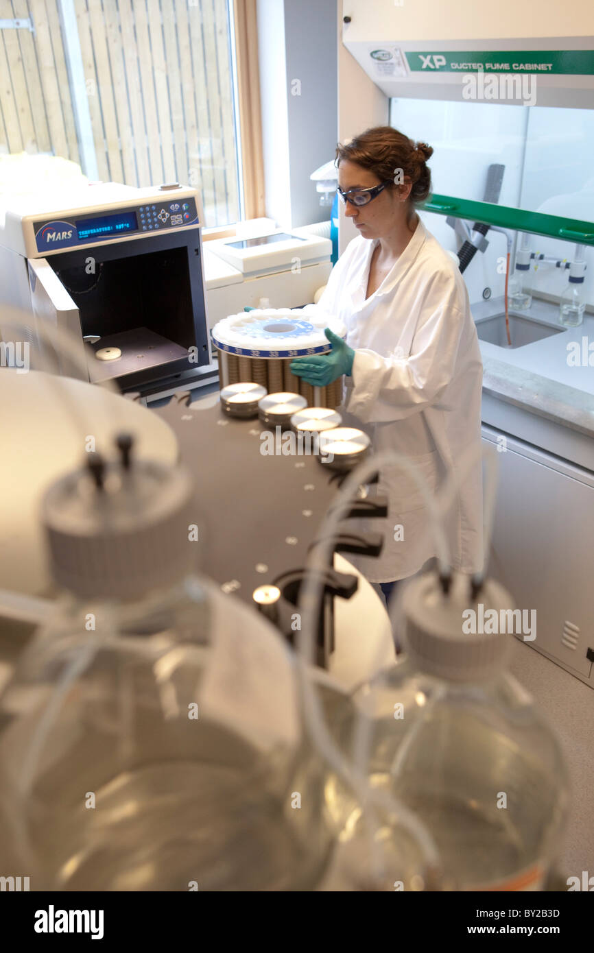 water samples from industrial waste water being sampled in a laboratory ...