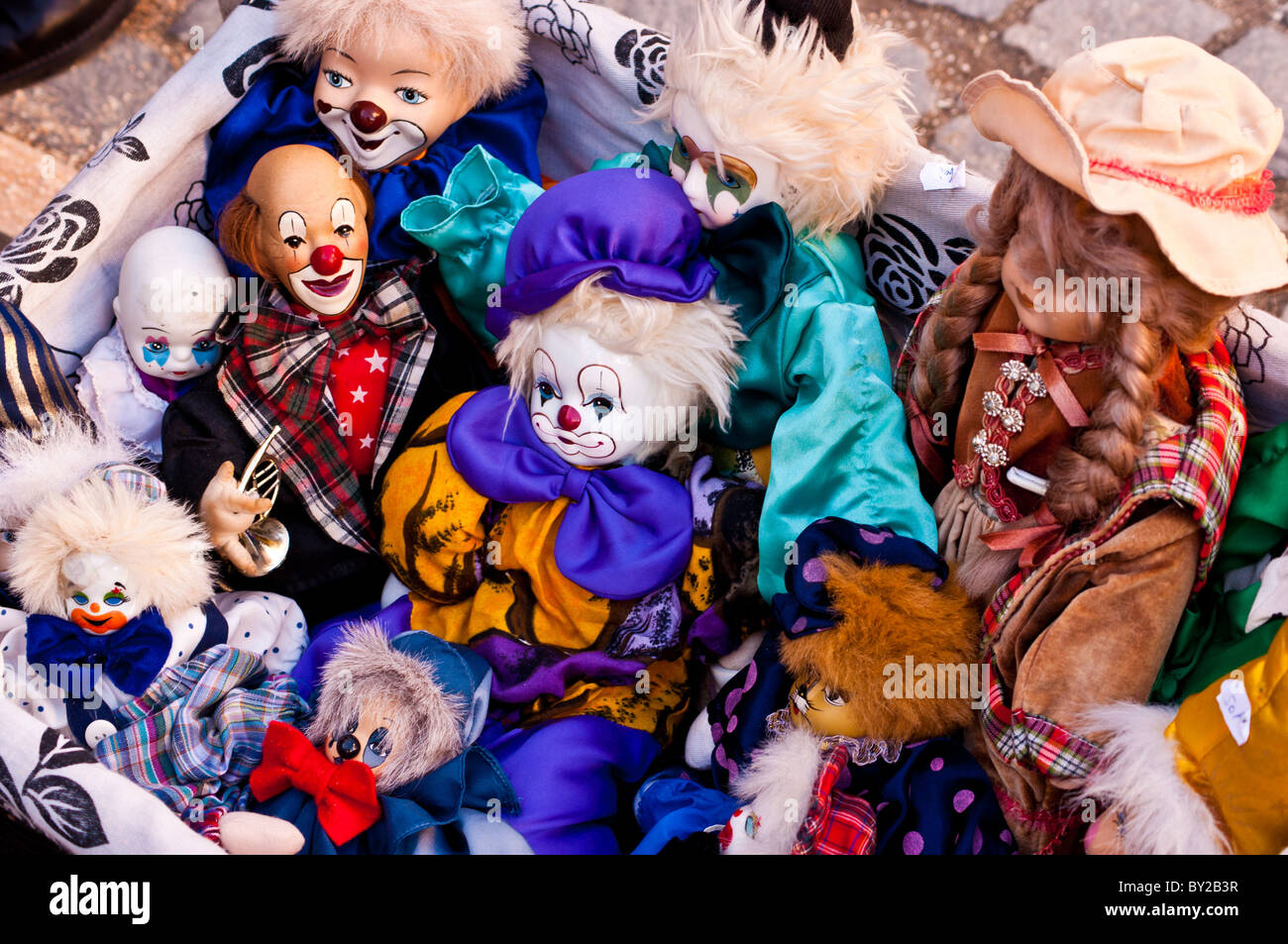 Lots of colorful puppets and toys representing circus clowns Stock ...