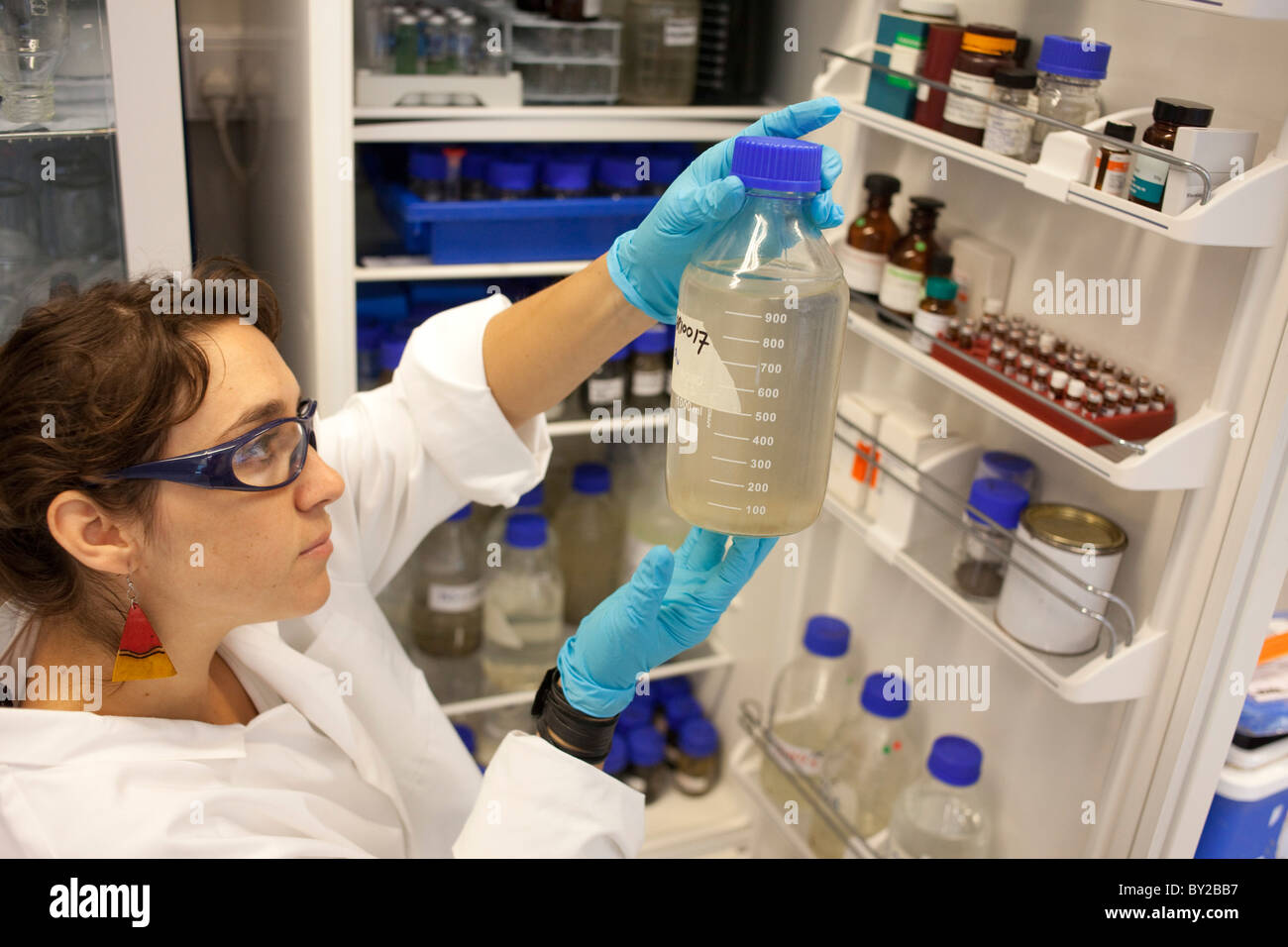 water samples from industrial waste water being sampled in a laboratory ...