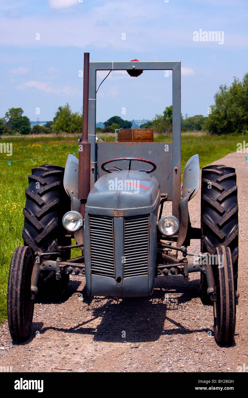 An old tired looking tractor Stock Photo - Alamy
