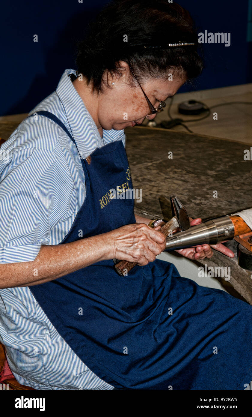 Worker hammer design in Pewter Factory called Royal Selangor in Kuala ...