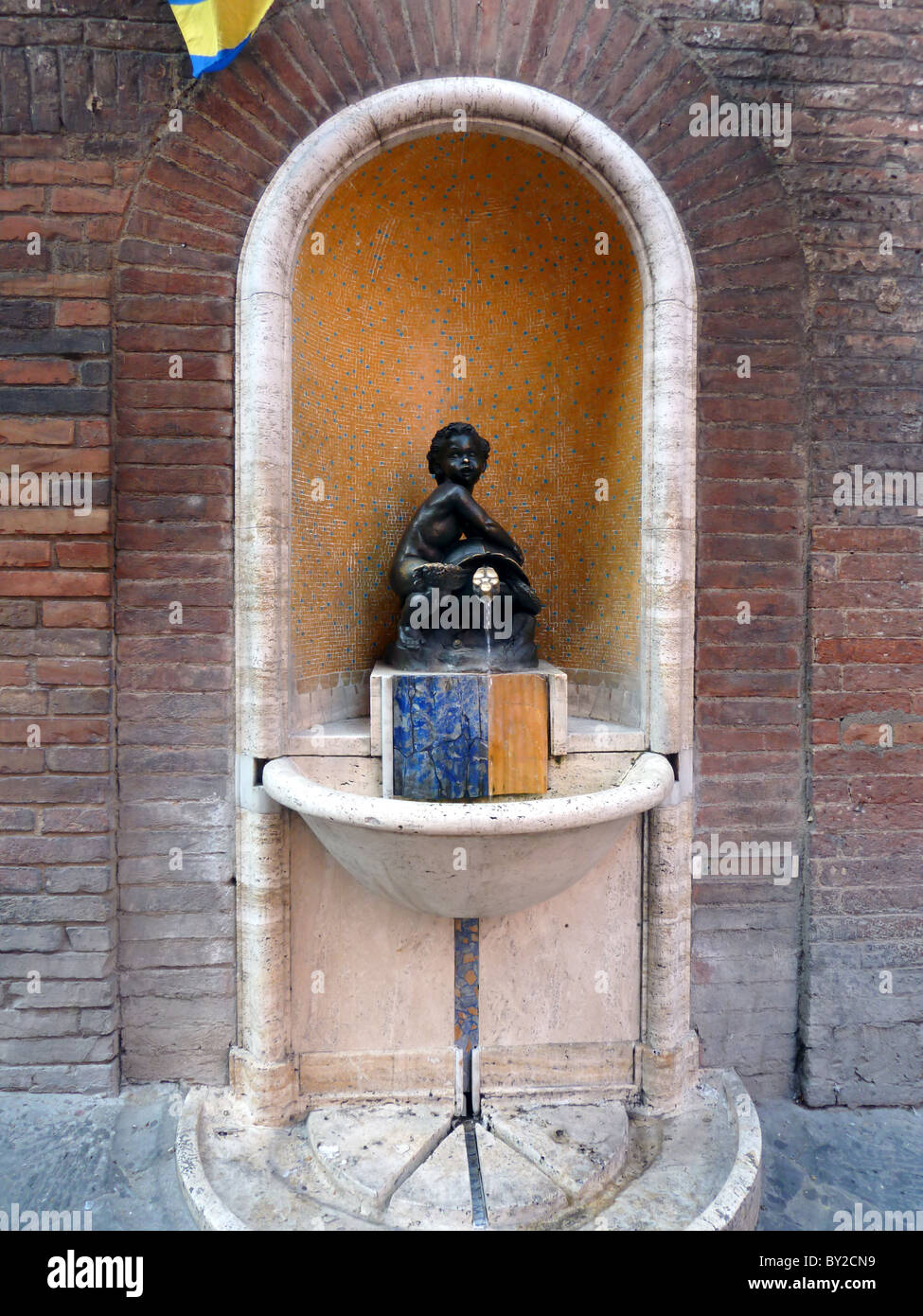 Bronze boy turtle statue siena hi-res stock photography and images - Alamy