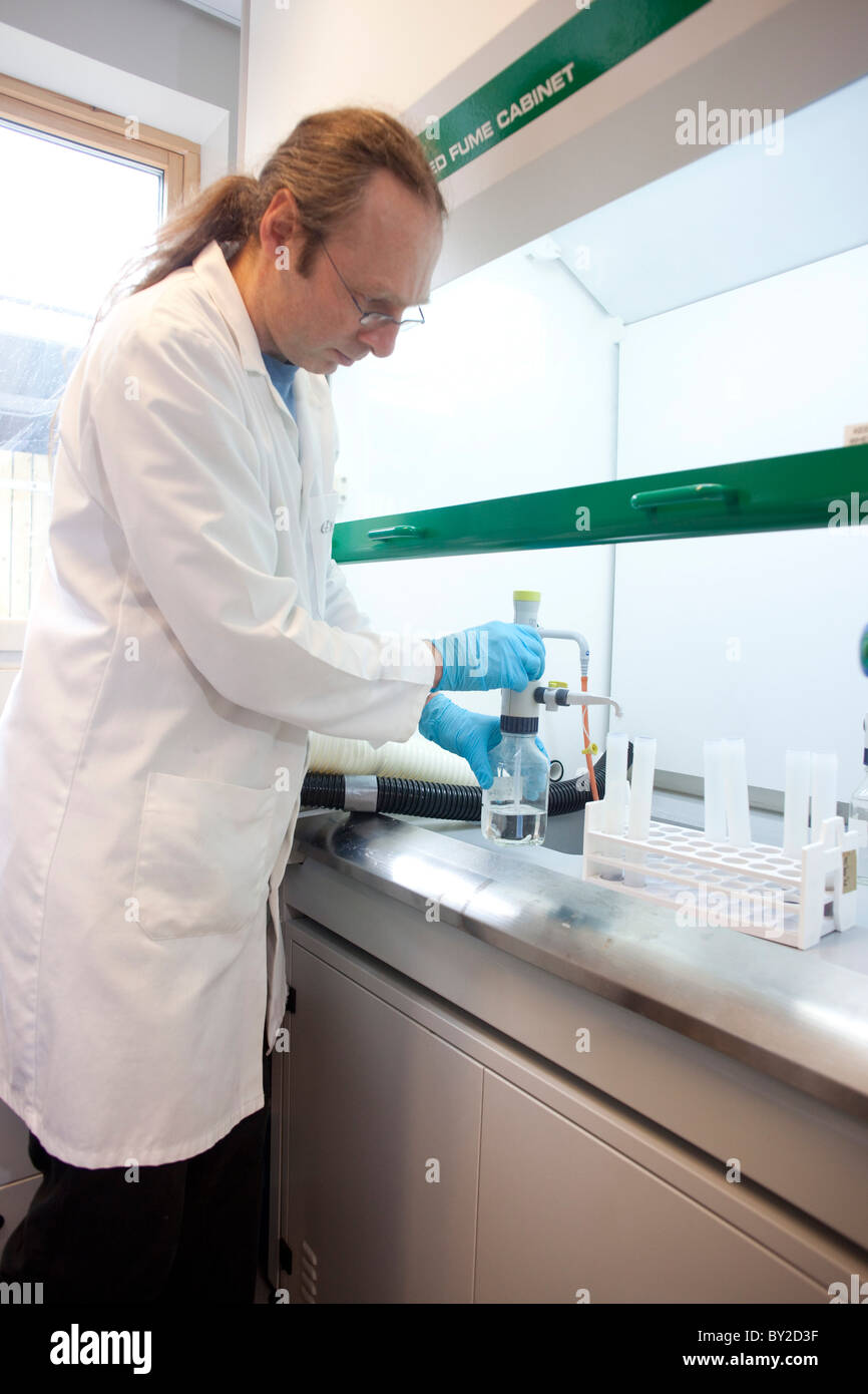 Scientists in University laboratory at Exeter Greenpeace Lab Stock ...